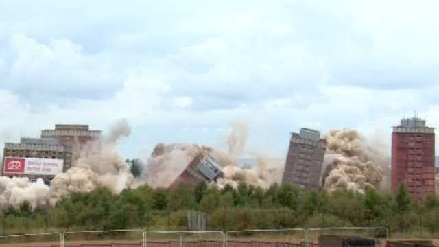 Glasgow tower blocks tumble in controlled explosion - BBC News