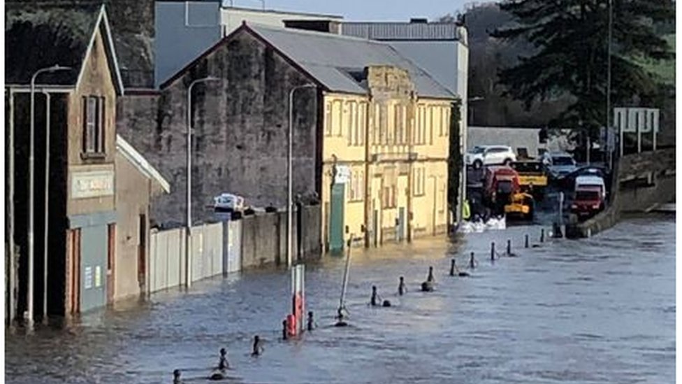 Landslip warning and flooding follow heavy rain in Wales - BBC News